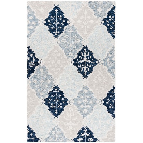 Ebony Ebn128 Handmade Tufted Area Rug - Blue/ivory - 6' X 9' - Safavieh ...